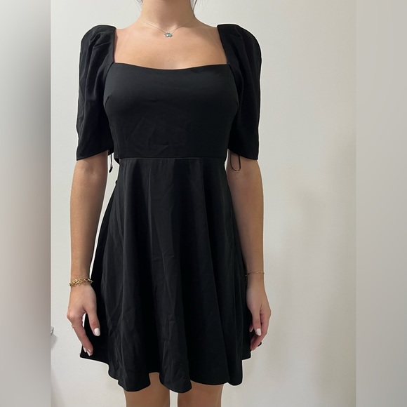 Lucy Paris | Dresses | Black Mini Dress With Small Side Cut Outs | Poshmark